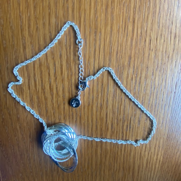 Liz Claiborne | Jewelry | Pendant All Individual Rings That Are Looped ...
